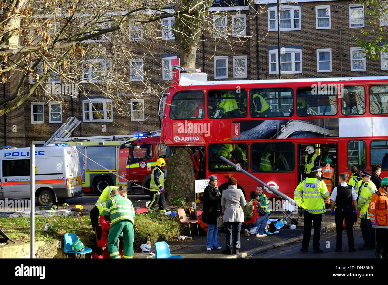 London, UK. 20th December 2013. NO.59 bus crashes into tree, many ...