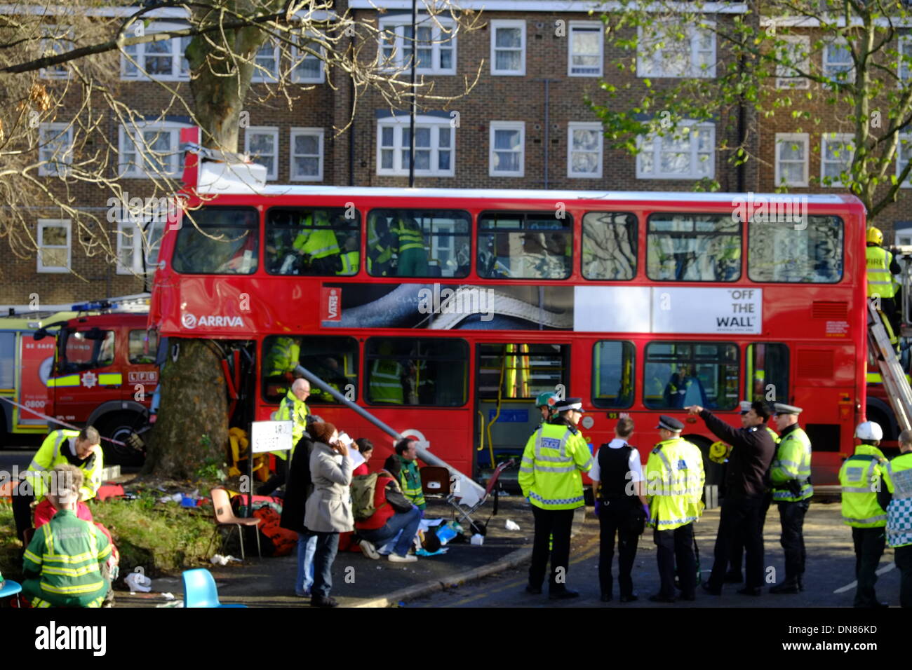 London, UK. 20th December 2013. NO.59 bus crashes into tree, many ...