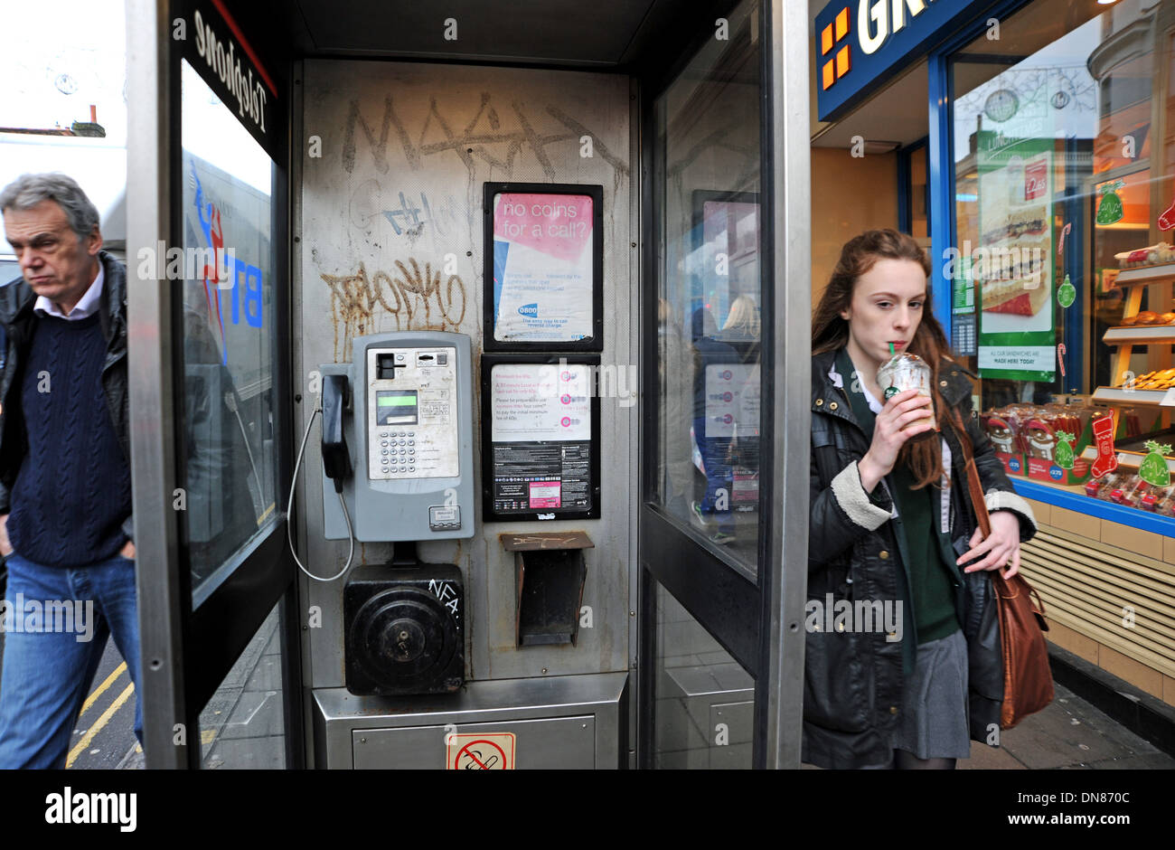 Phone booth with people hi-res stock photography and images - Alamy