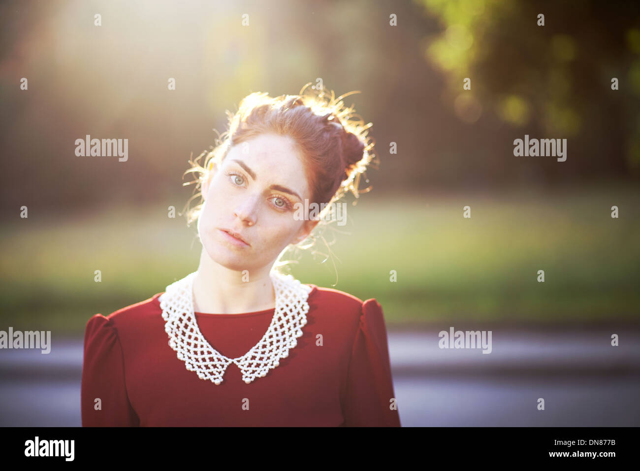 Young woman with serious expression, portrait Stock Photo - Alamy