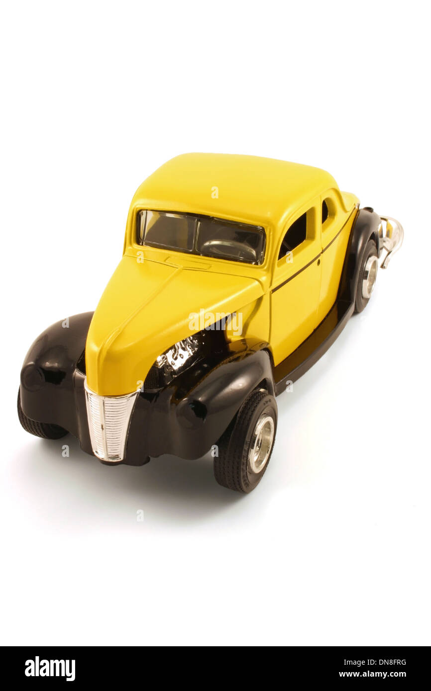 Vintage model car isolated on white background Stock Photo - Alamy