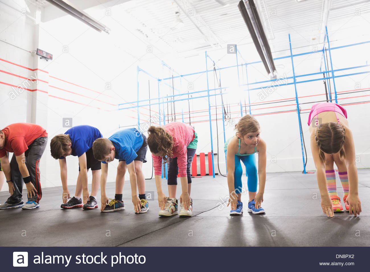 Children touching toes hi-res stock photography and images - Alamy