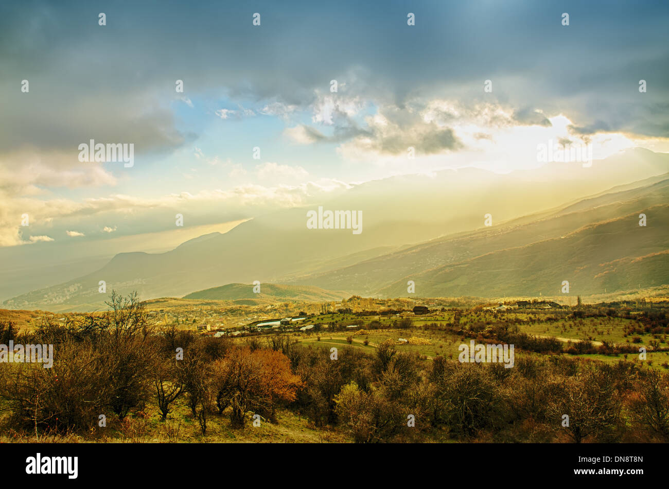 Rural landscape with sun rays Stock Photo - Alamy