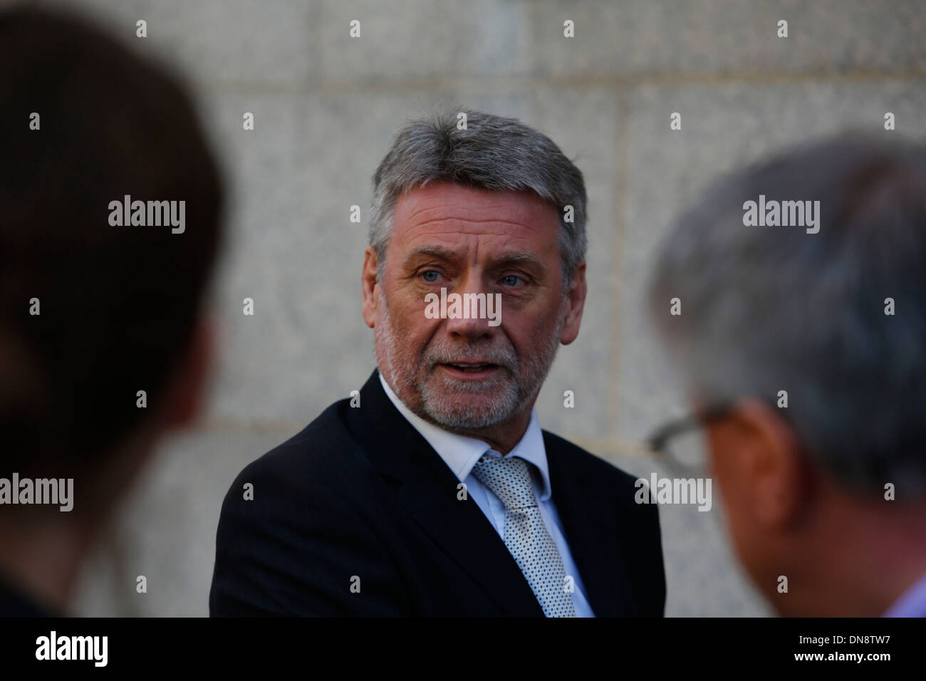 Former newspaper editor Neil John Wallis waits outside the Old Bailey ...