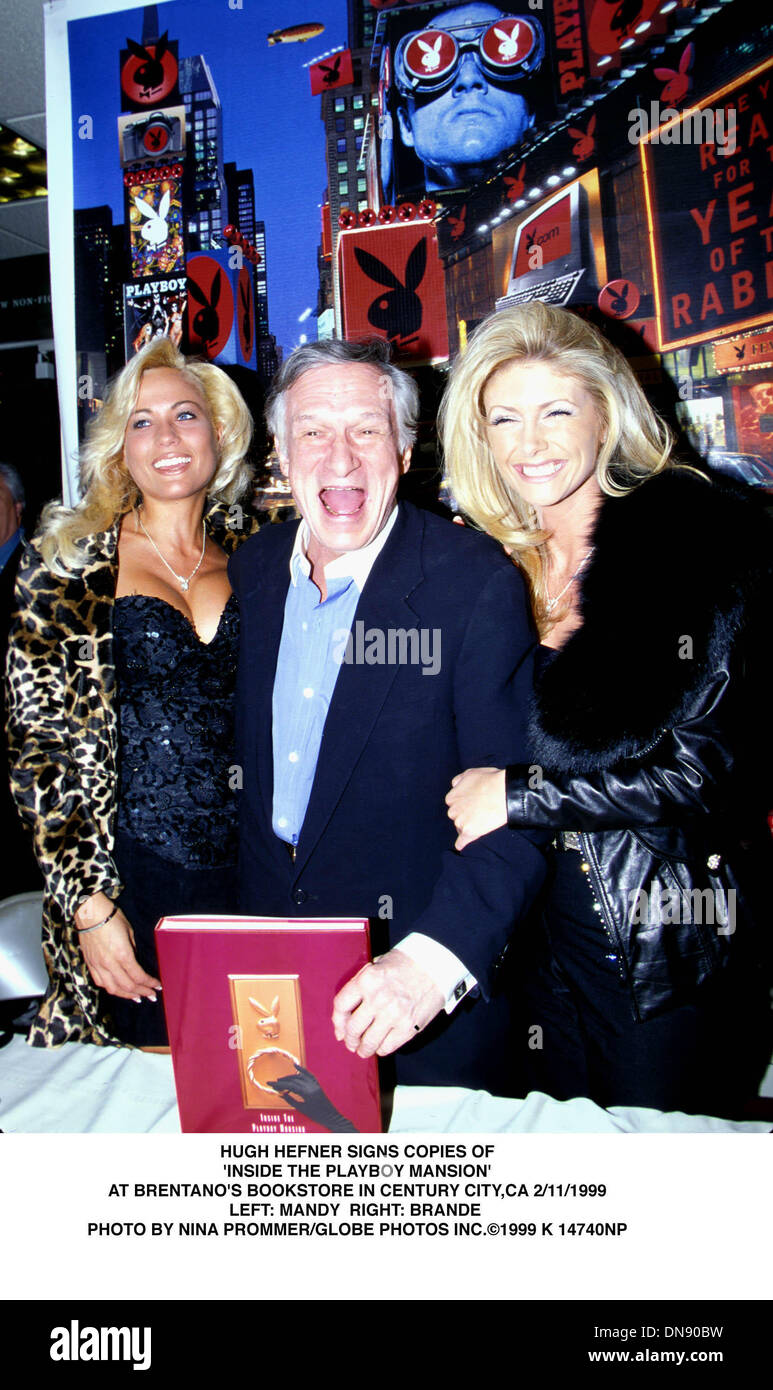 Feb. 11, 1999 - k14740NP 02/11/99.HUGH HEFNER SIGNS COPIES OF.''INSIDE ...