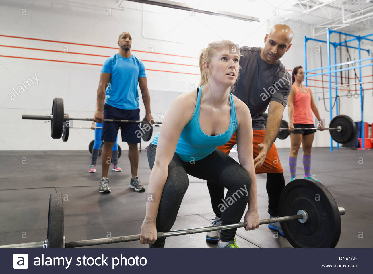 Woman with gym instructor hi-res stock photography and images - Alamy