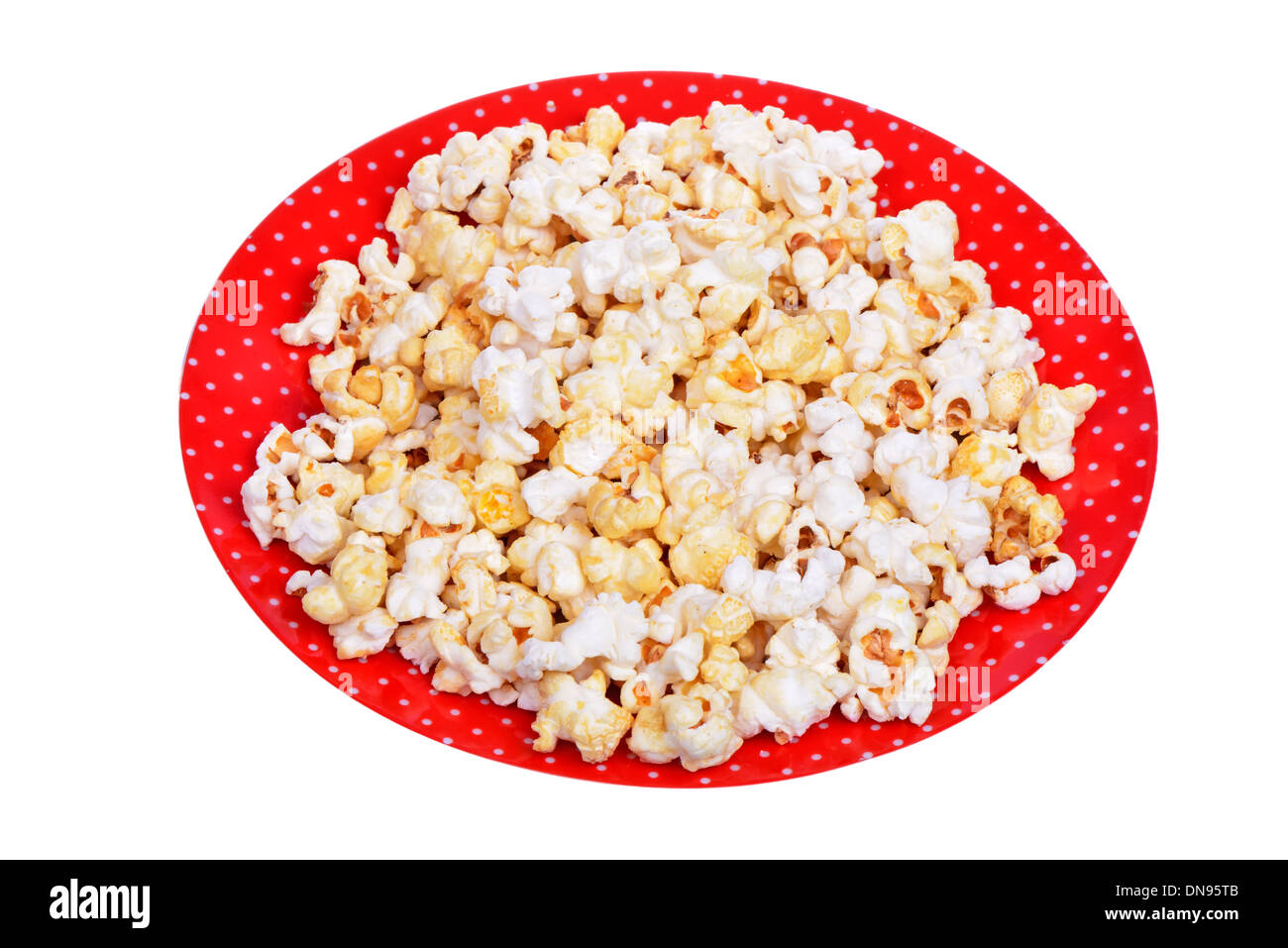 Popcorn on a plate isolated on white background Stock Photo - Alamy