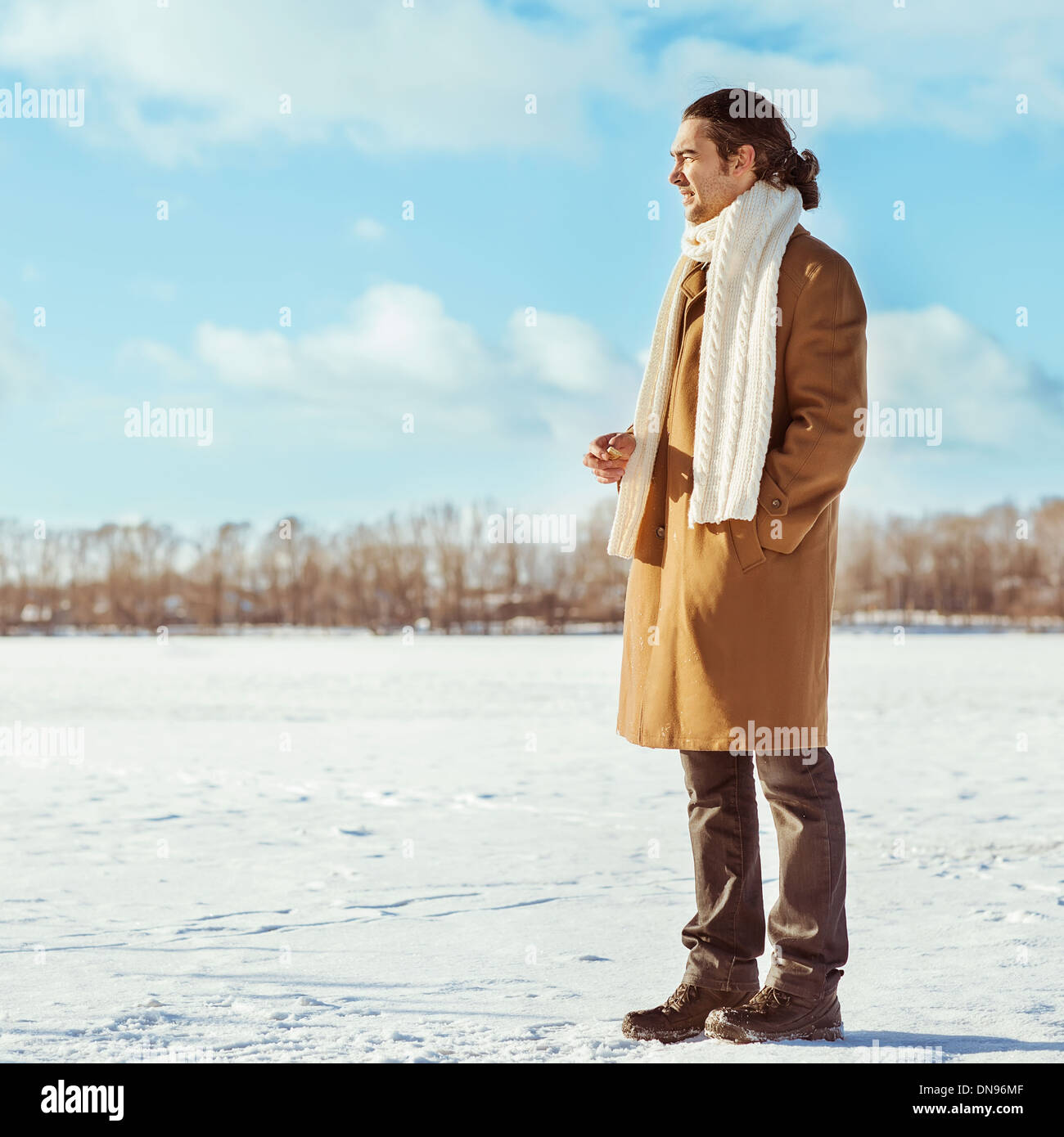Male model posing in snow hi-res stock photography and images - Alamy