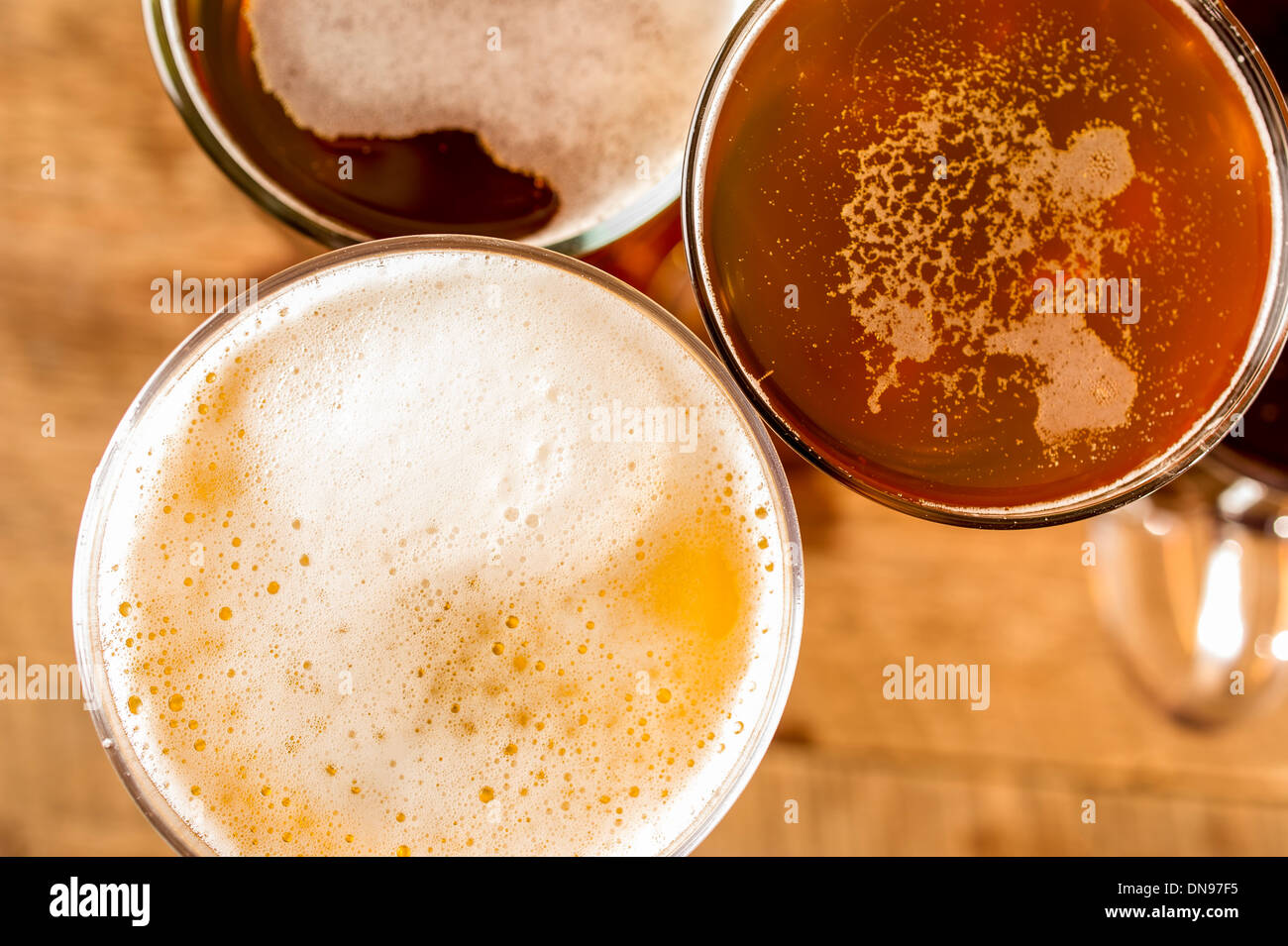 Pints of ale and beer in glasses on a table, UK Stock Photo - Alamy