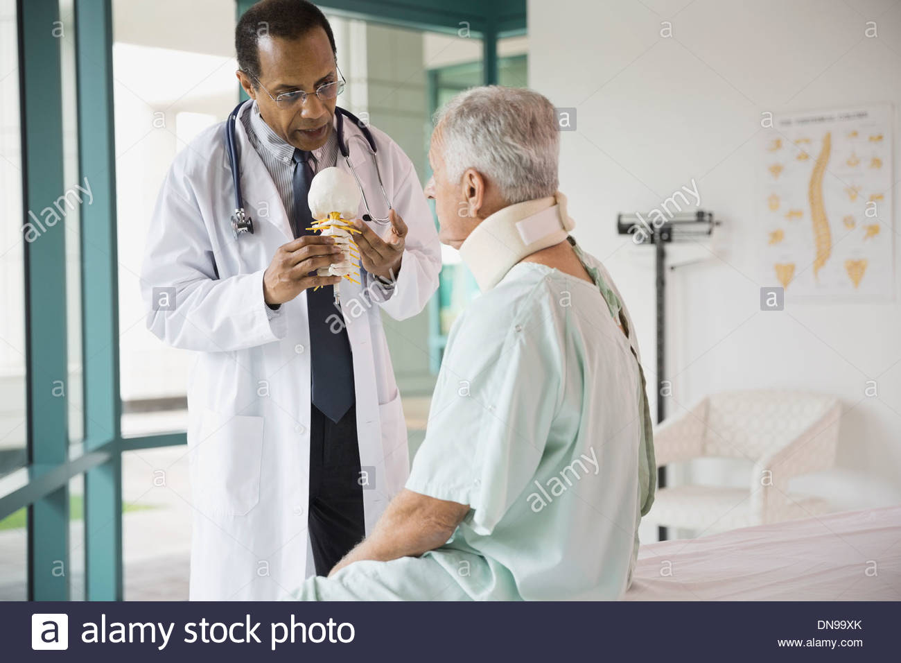 Doctor explaining anatomical model senior hi-res stock photography and ...