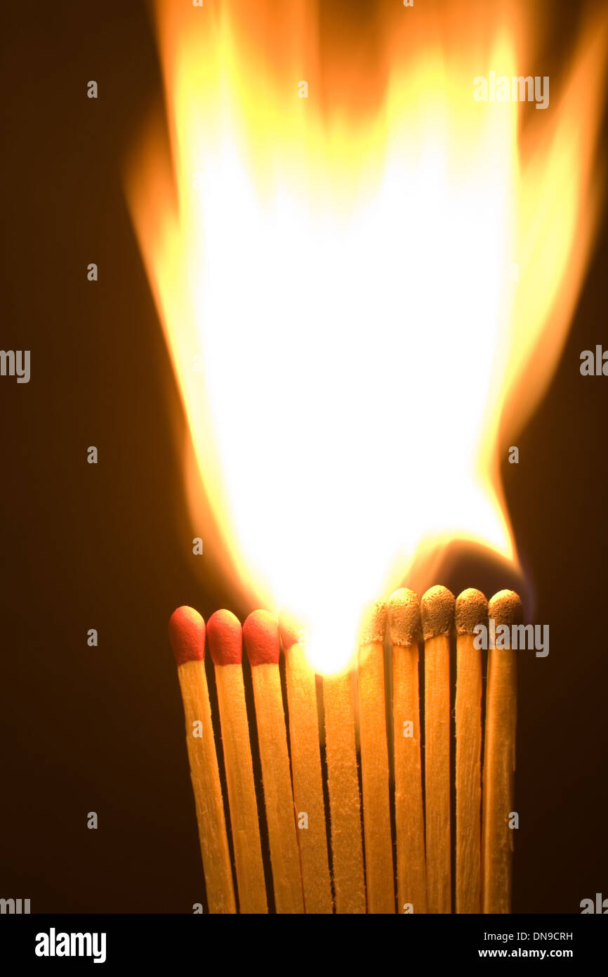 Burning Matches with black background Stock Photo - Alamy