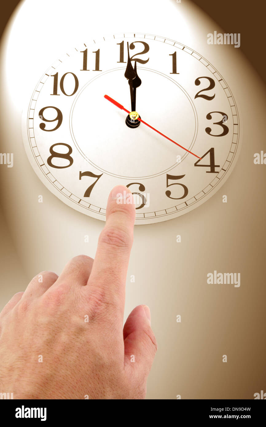 hand and clock with white background, concept of time control Stock ...