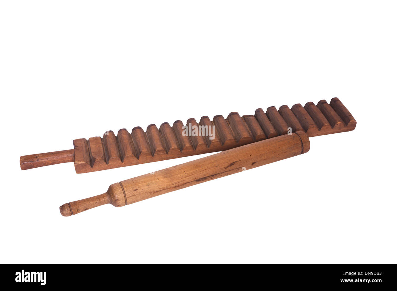 old wooden instruments to washing on a white background Stock Photo - Alamy