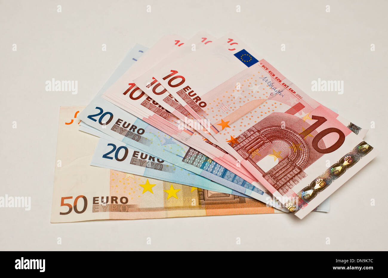 Euro notes on a white background Stock Photo - Alamy