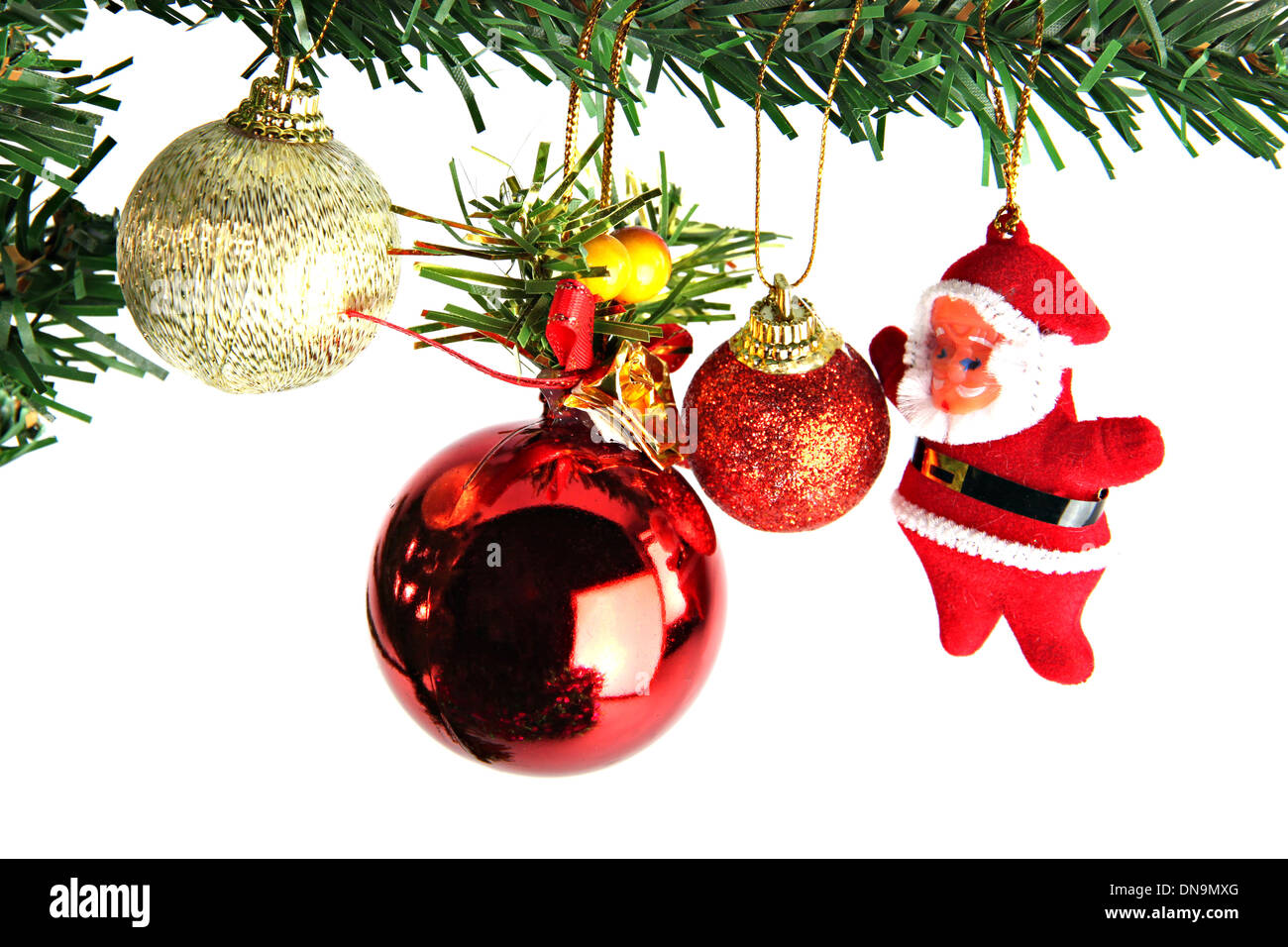 Red balls and Santa doll hanging on Christmas tree Stock Photo - Alamy
