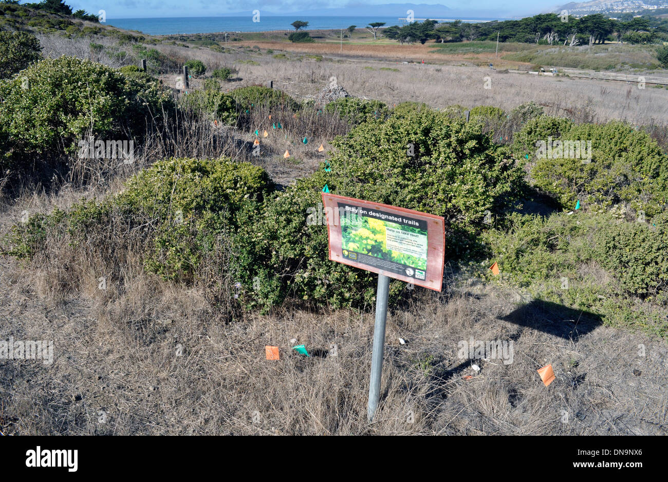 planting site, stay on trails, sign Stock Photo - Alamy