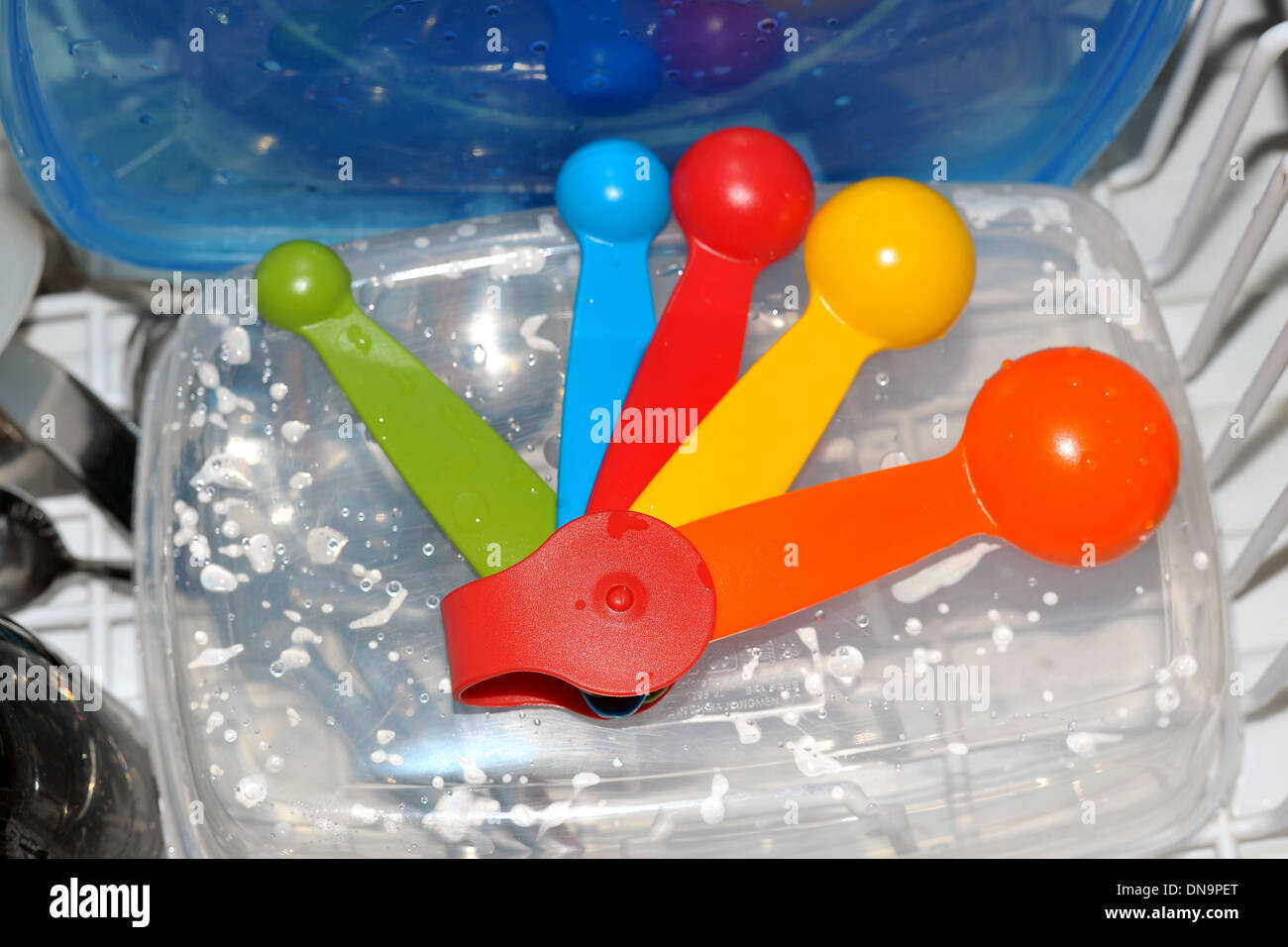 Images of brightly coloured measuring spoons Stock Photo - Alamy