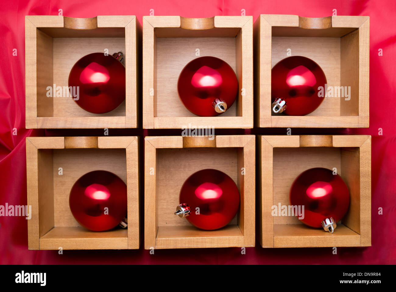 six red balls on wooden boxes Stock Photo - Alamy