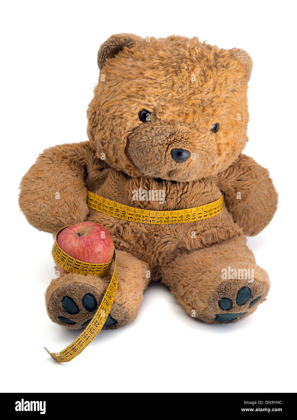 Teddy Bear with tape and an apple. Isolated on white background Stock ...