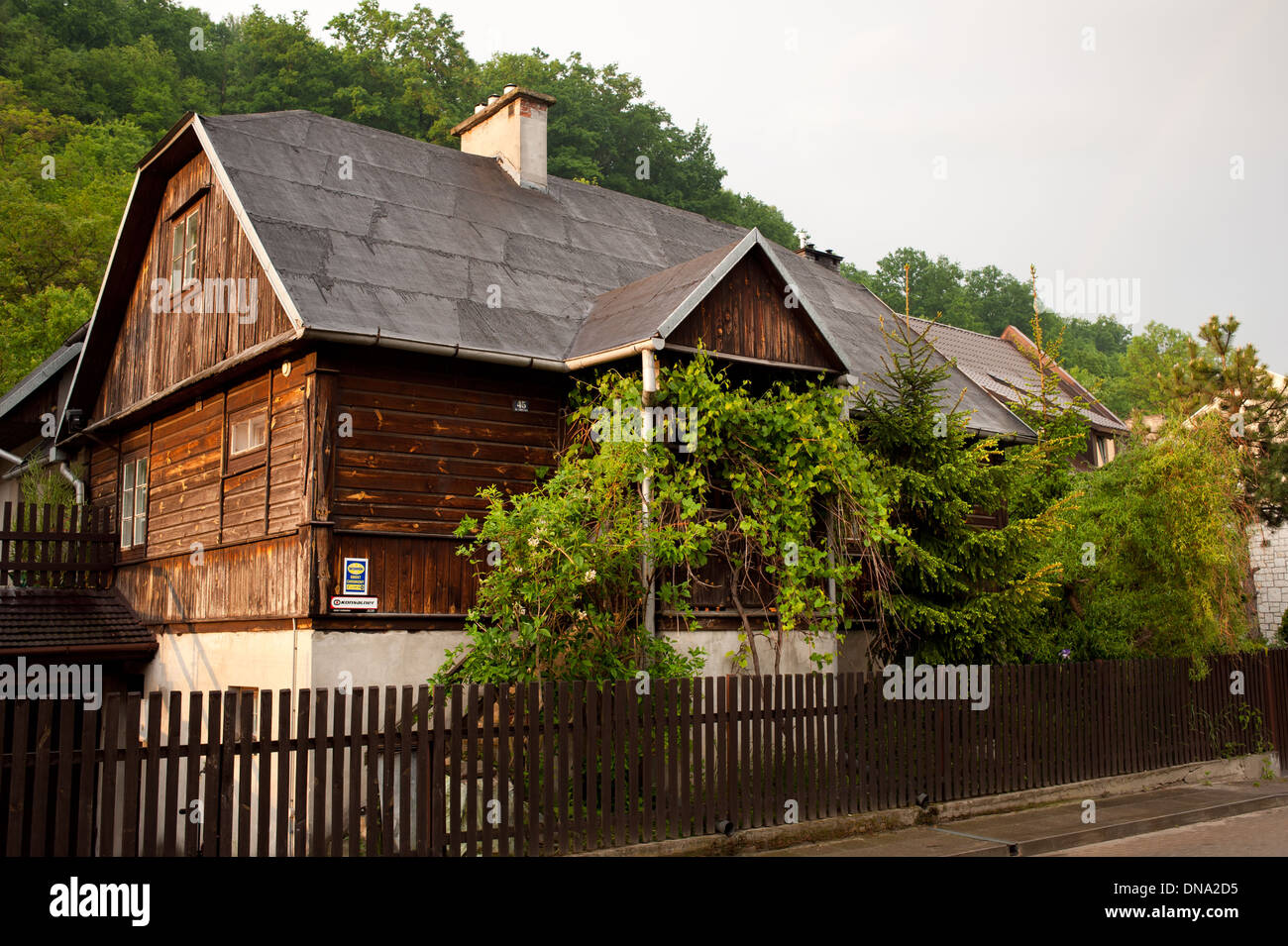 old wooden house with tar on roof Stock Photo - Alamy