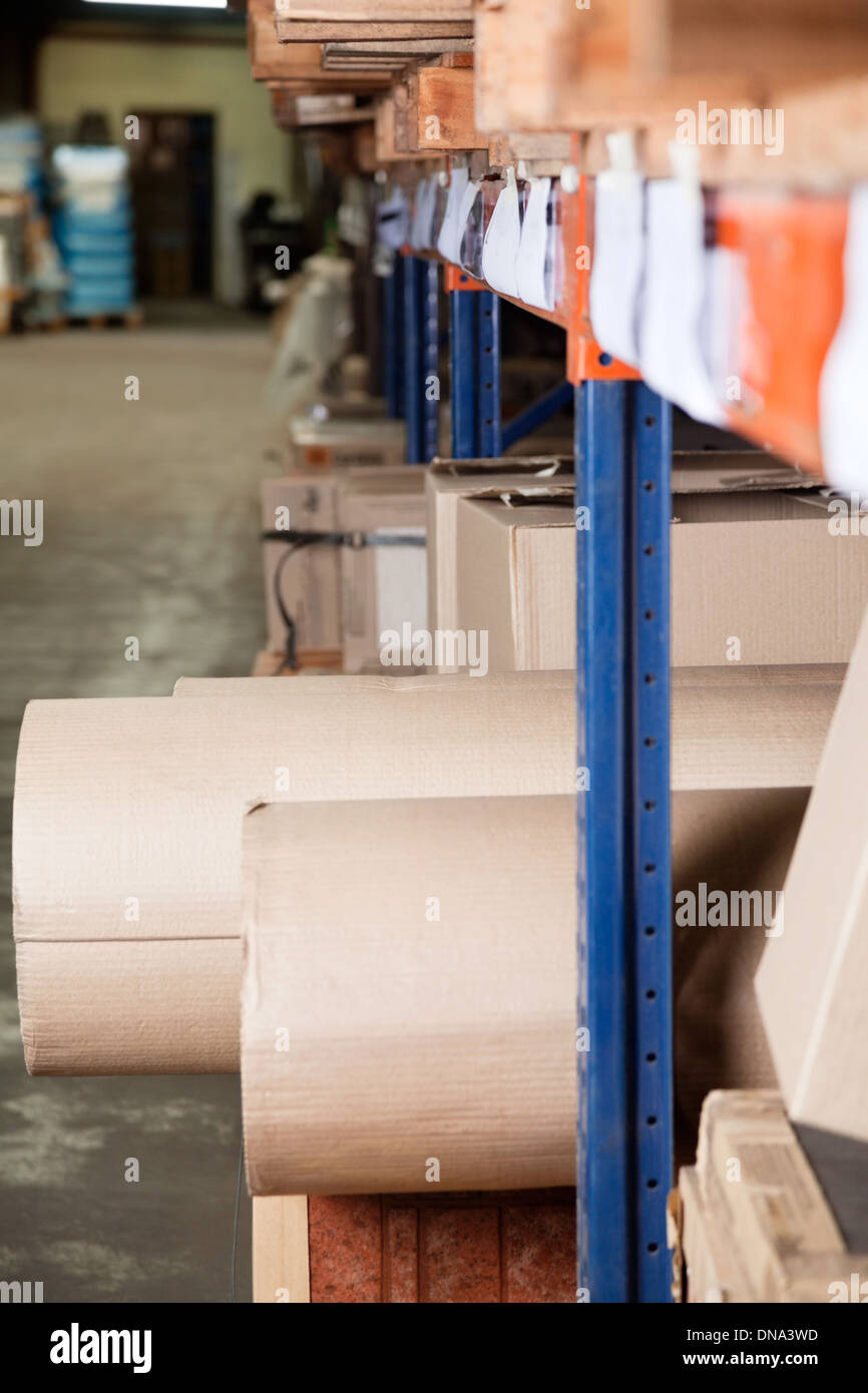 Cardboard Rolls And Boxes Stored In Warehouse Stock Photo - Alamy