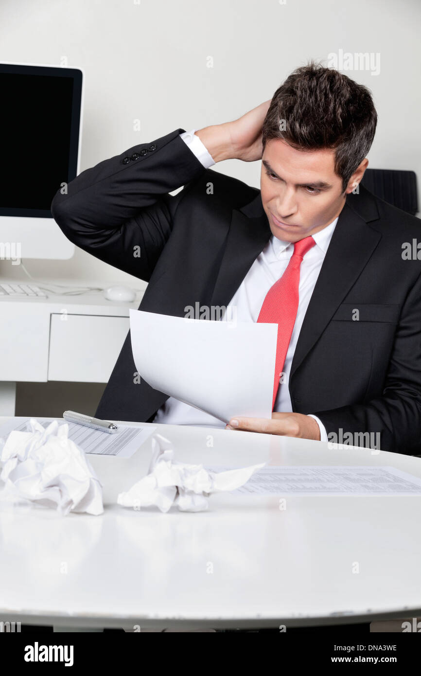 Confused adult businessman sitting hi-res stock photography and images ...
