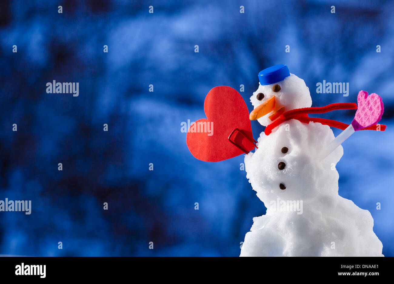 Winter. Funny valentine snowman with paper red heart love symbol for ...