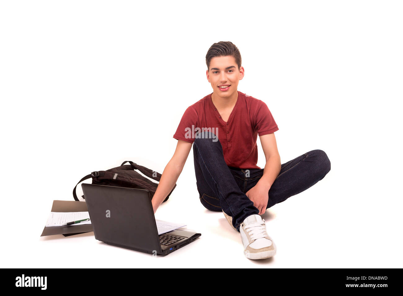 Young boy studying, isolated over a white background Stock Photo - Alamy