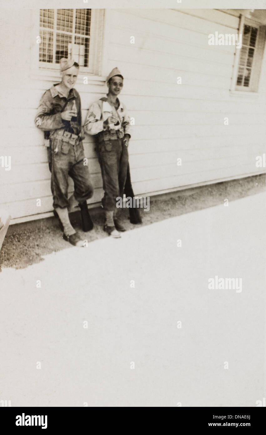 Portrait of Military Soldiers Leaning Against Military Building, WWII ...