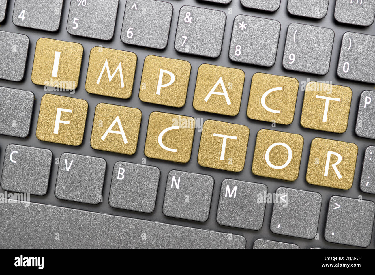 Impact factor key on keyboard Stock Photo - Alamy