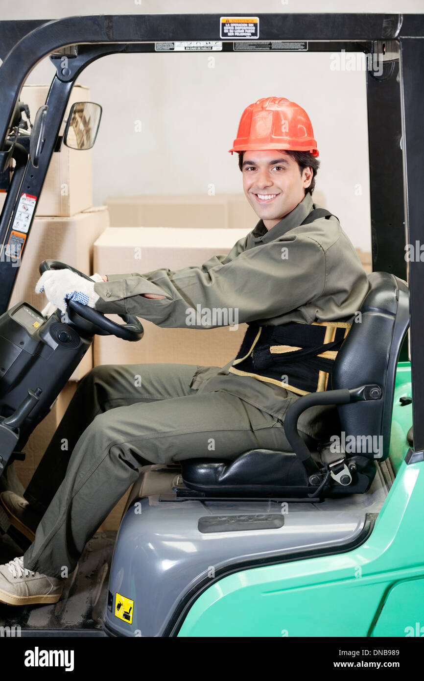 Portrait Of A Confident Forklift Driver Stock Photo - Alamy