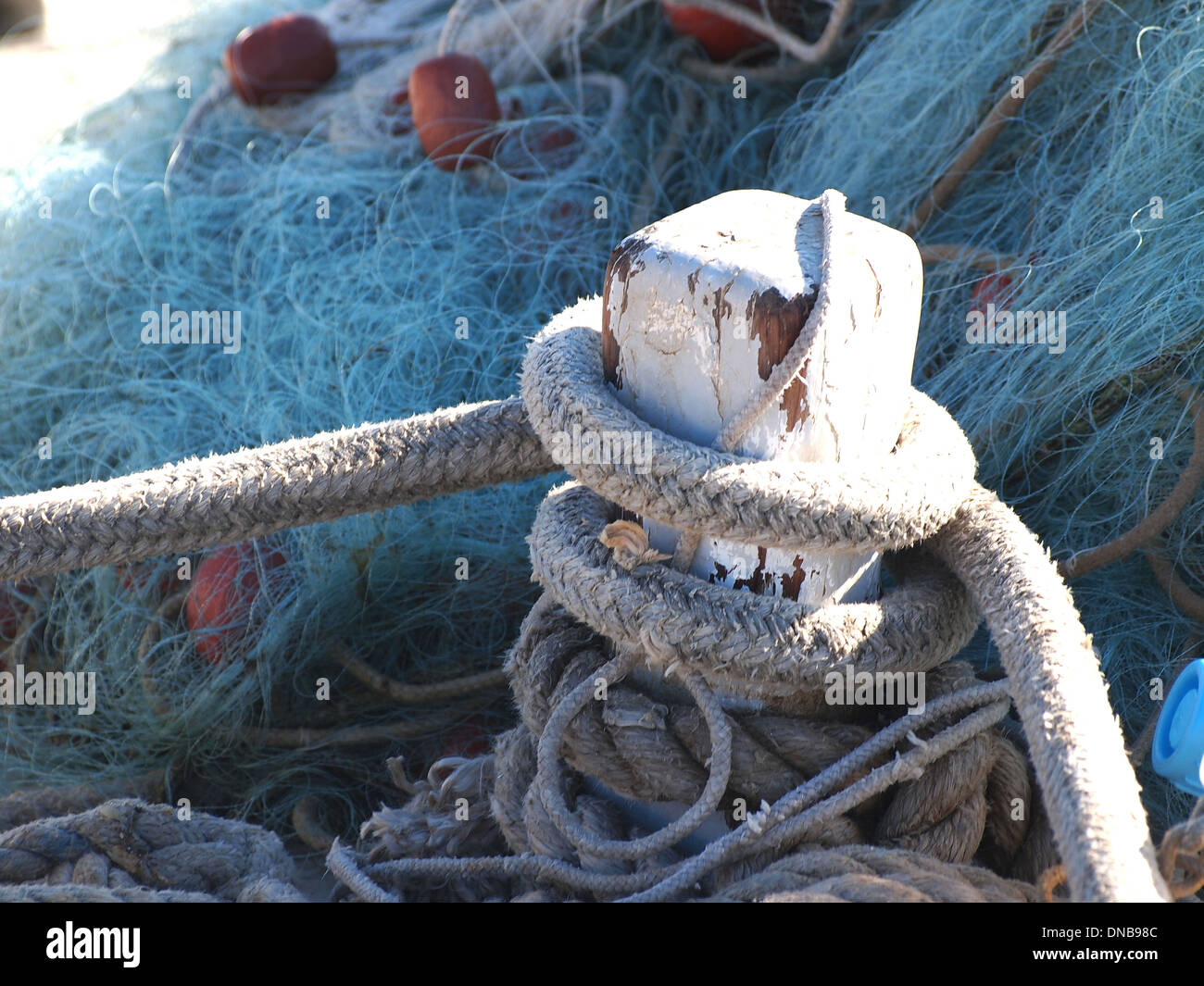ropes and net on fishing boat Stock Photo - Alamy