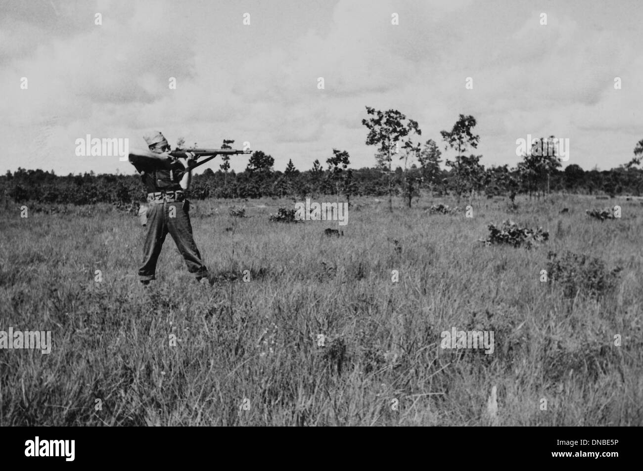 Soldier Displaying Proper Shooting Position in Field During Training ...