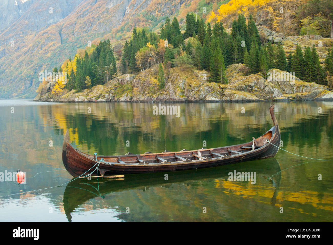 A beautiful Viking rowboat is moored in Nærøyfjord near Gudvangen ...