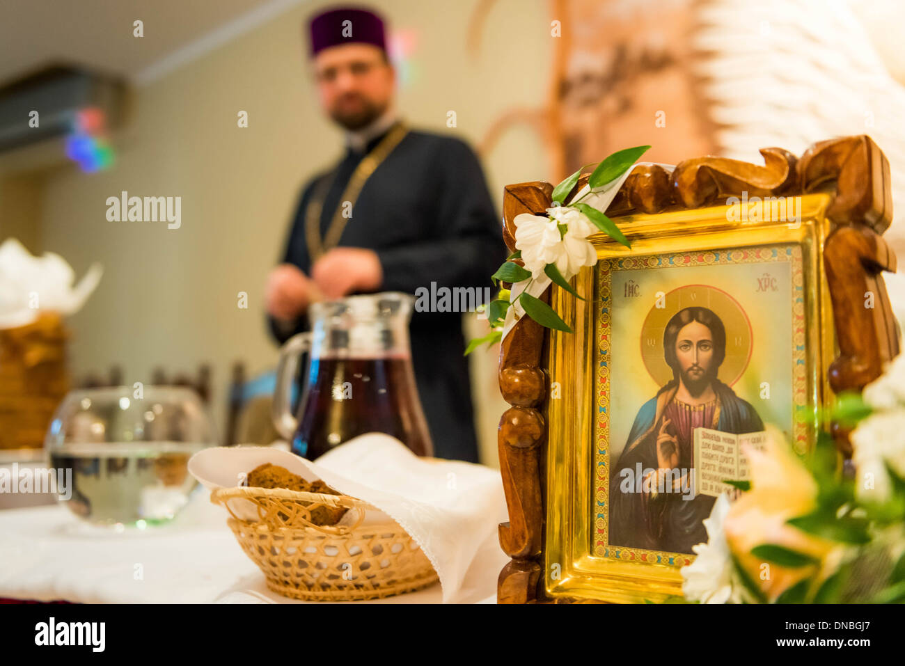 Orthodox wedding day icon and priest Stock Photo - Alamy