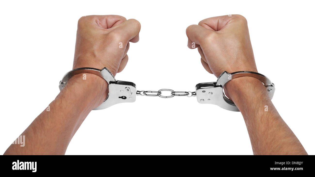 Hands in handcuffs isolated on white background Stock Photo - Alamy