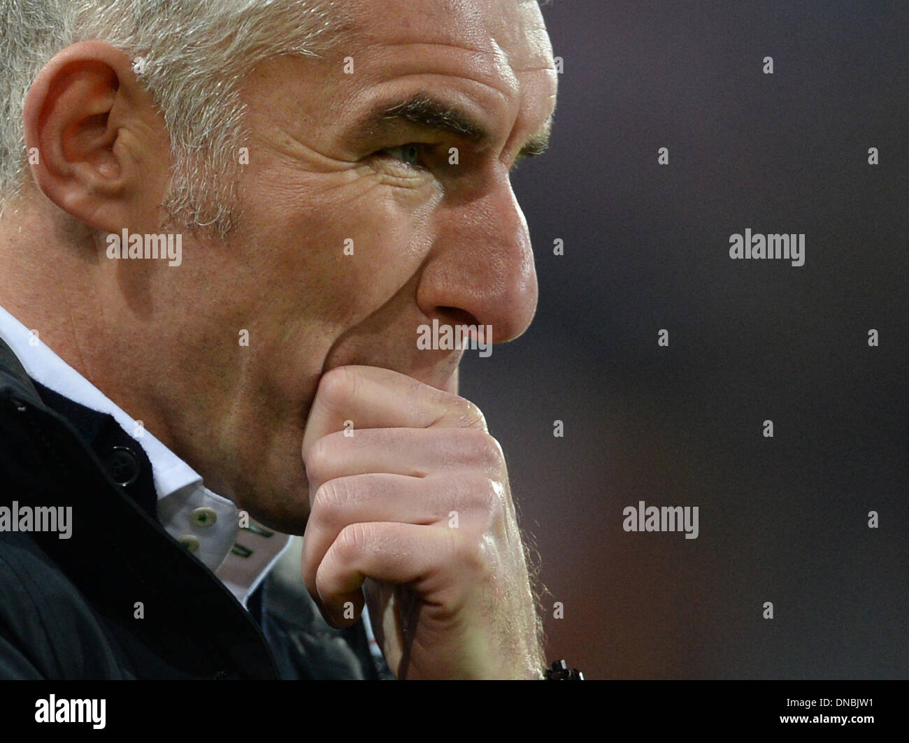 Freiburg, Germany. 21st Dec, 2013. Coach Mirko Slomka of Hanover holds ...