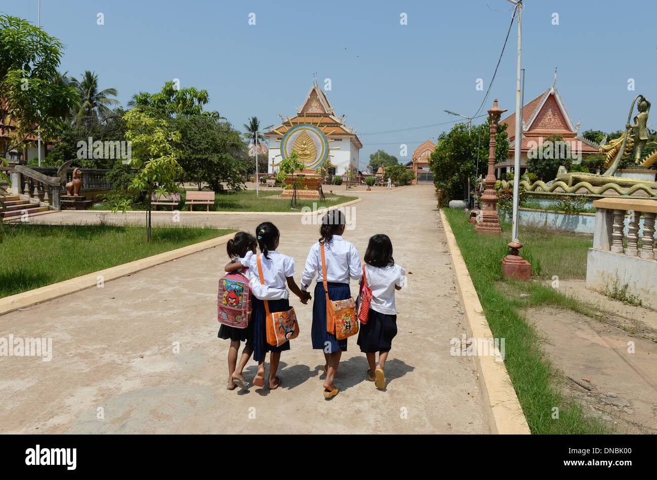 Phnam Penh, Cambodia. 11th Oct, 2013. School children walk past the ...