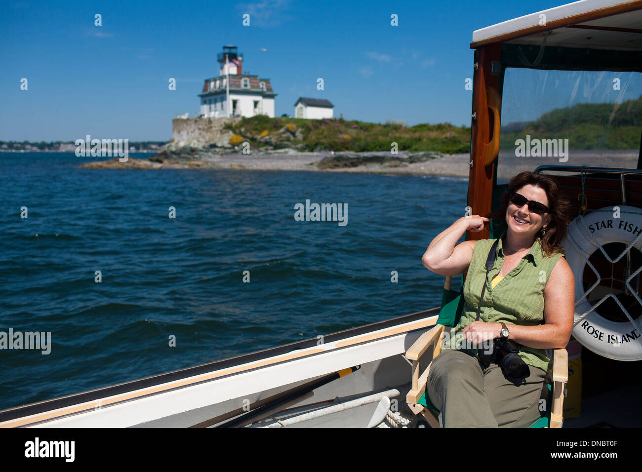The launch transports guests and visitors to Rose Island lighthouse B&B ...