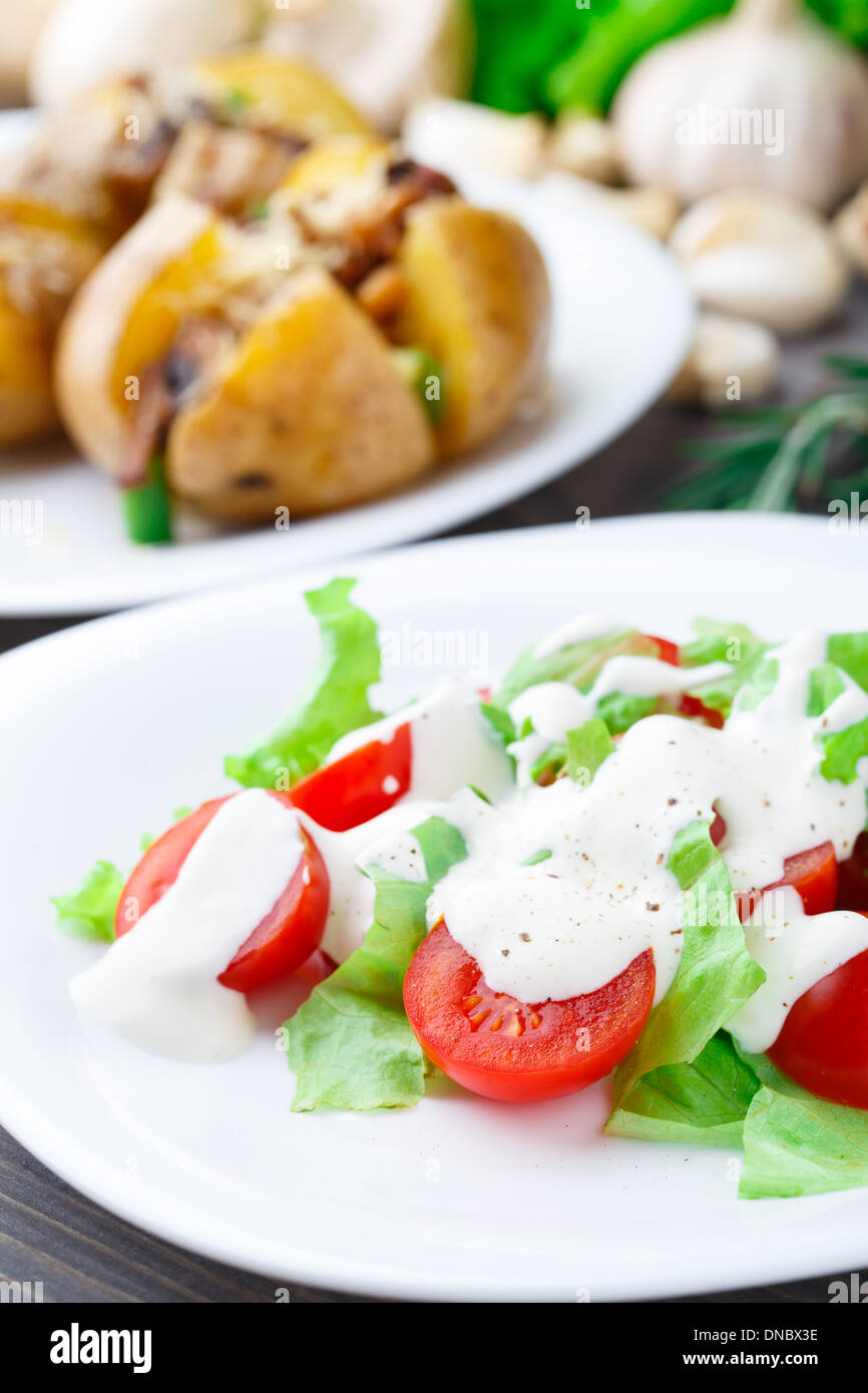 Tomato and lattuce salad Stock Photo - Alamy