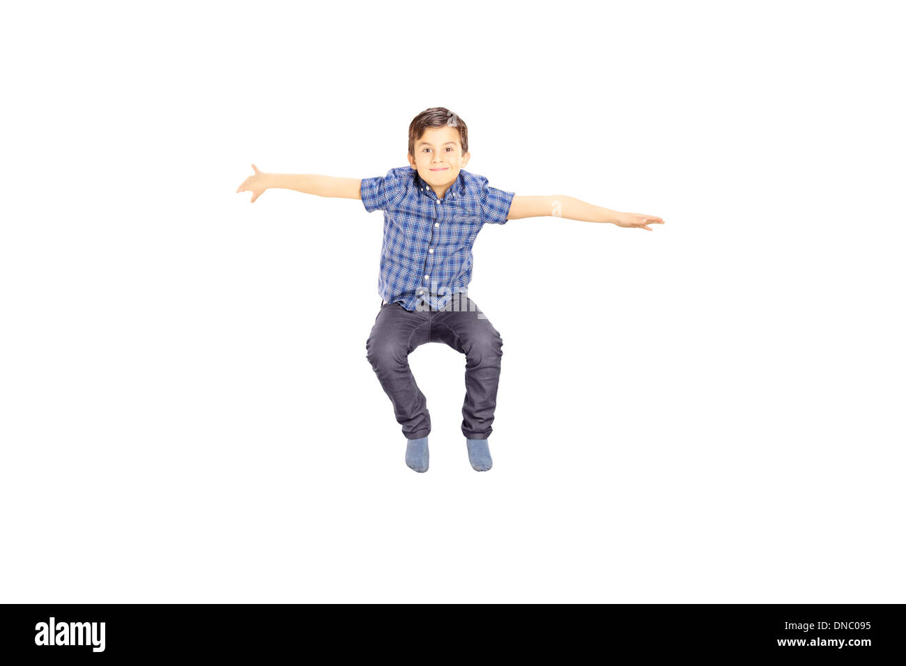 Child jumping with joy hi-res stock photography and images - Alamy