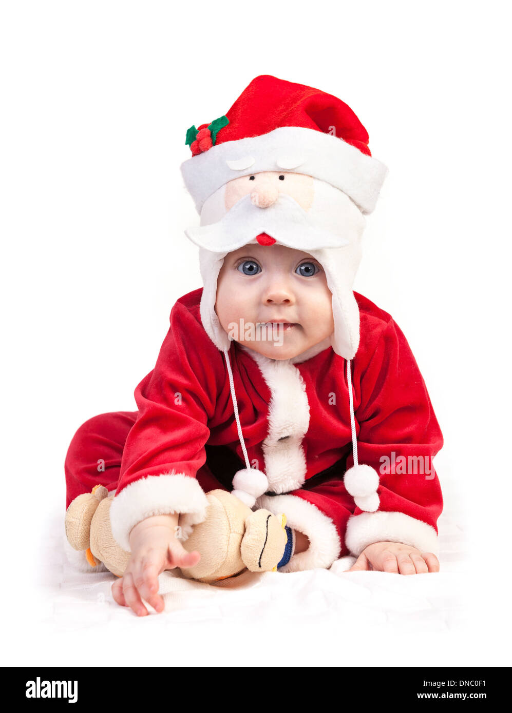 Cute little boy in Santa costume over white background Stock Photo - Alamy