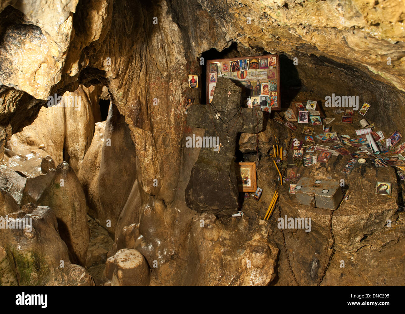 Shrine with religious artifacts in the Ialomicioara Cave in the Bucegi ...