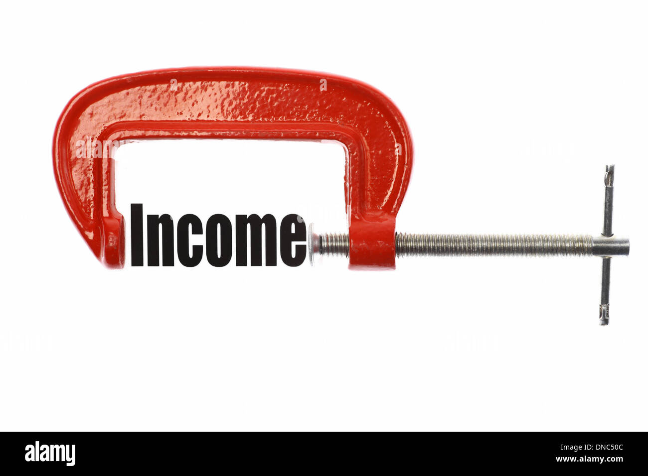 The word "Income" is compressed with a vice Stock Photo - Alamy