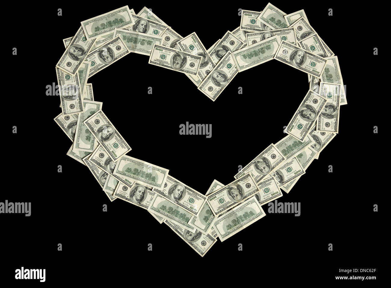Money in a shape of heart Stock Photo - Alamy