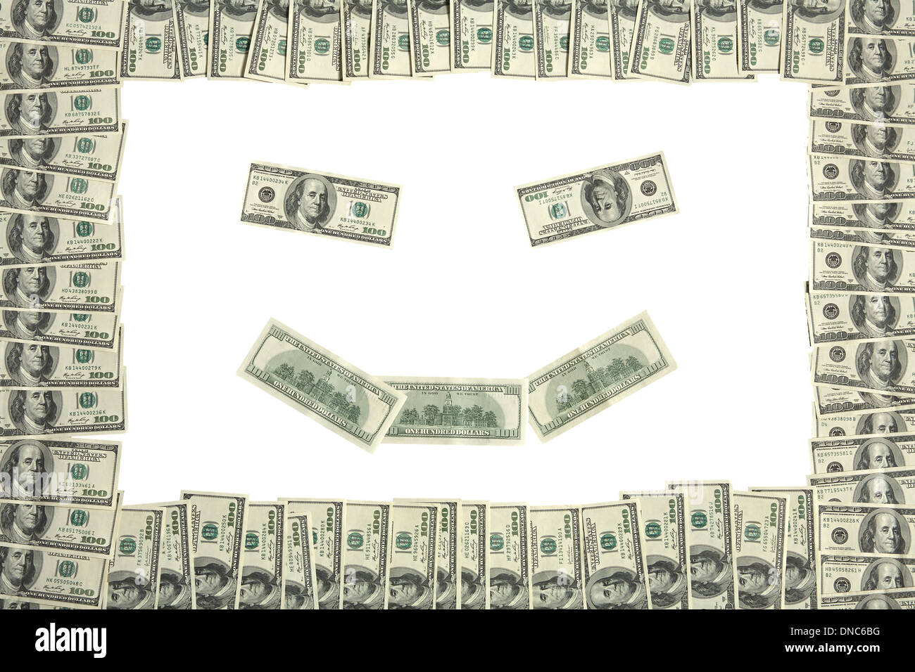 Sly face in dollar bill frame Stock Photo - Alamy