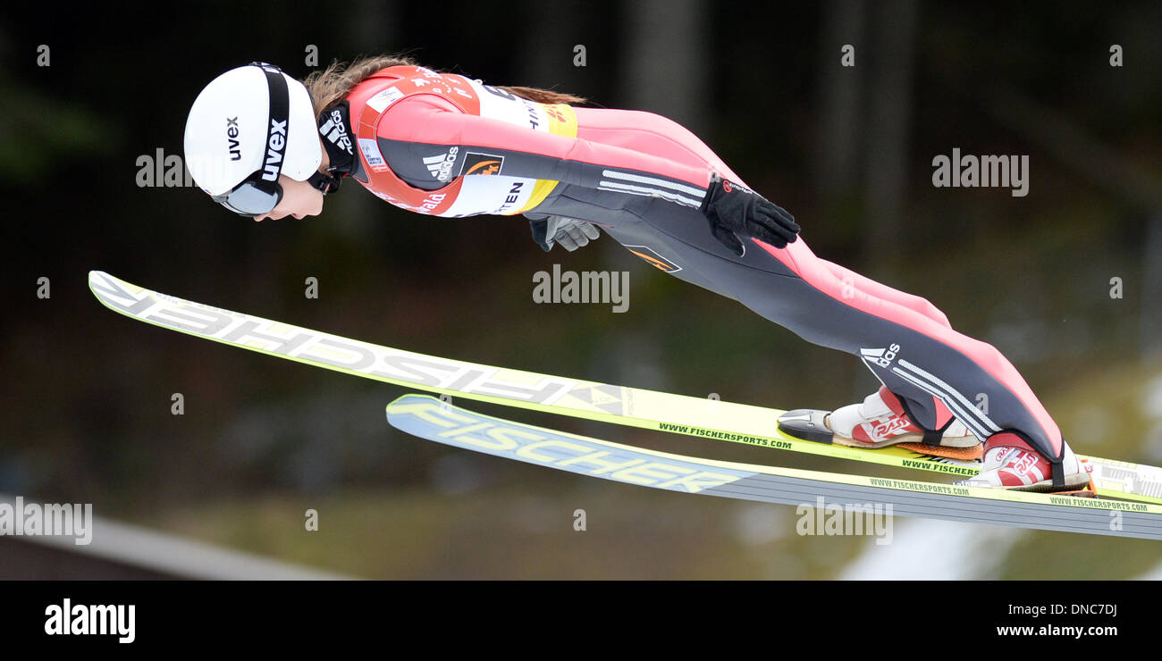 Hinterzarten, Germany. 22nd Dec, 2013. Russia's Irina Avvakumova takes ...