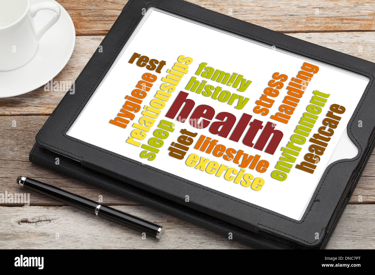health concept word cloud on a screen of digital tablet Stock Photo - Alamy