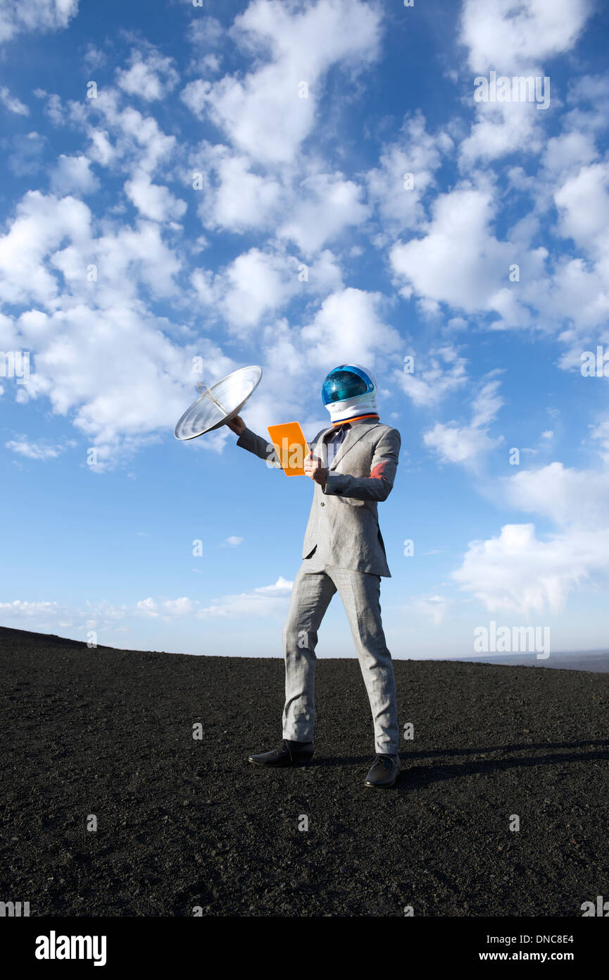 Astronaut businessman traveling into the future of communication with ...