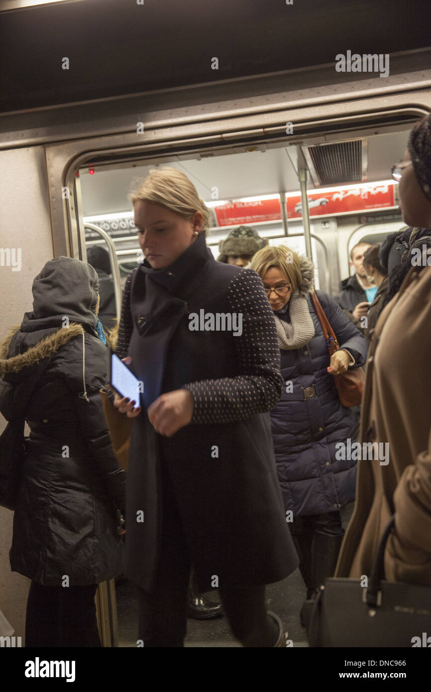 Subway train in the station at Grand Central Station during the evening ...